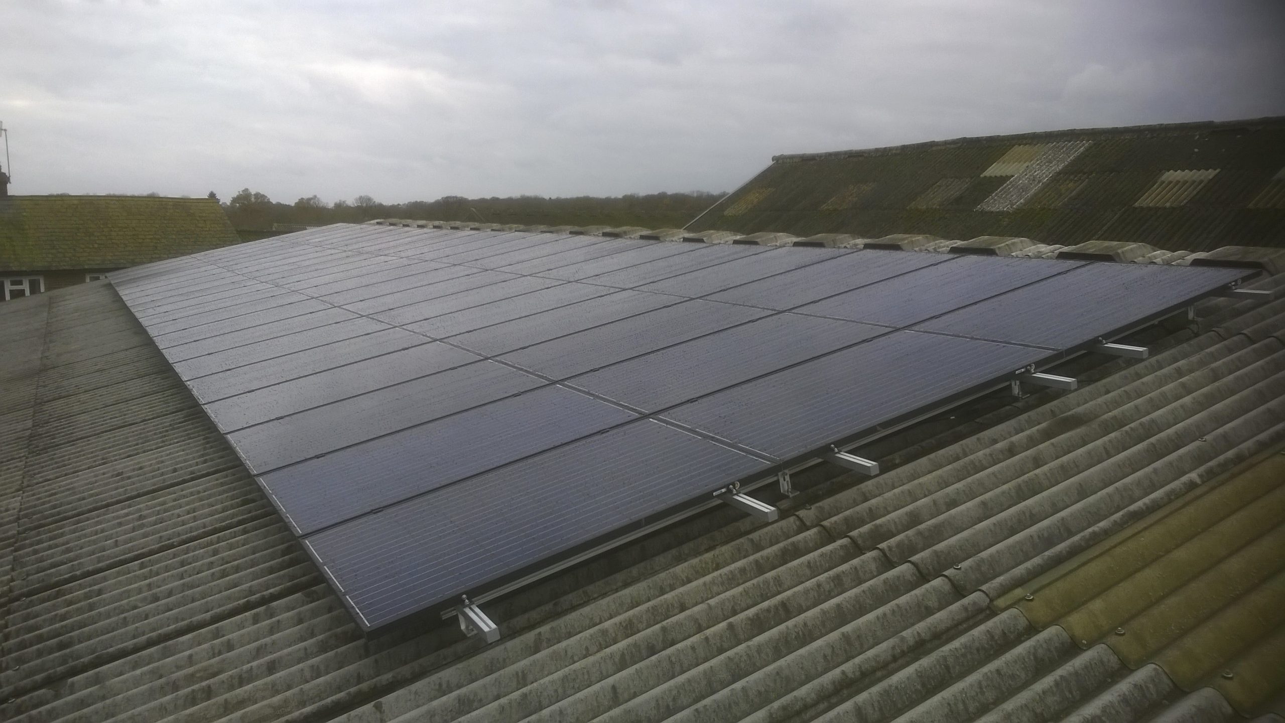 A 15 kWp photovoltaic array supplying a farm buildings and house ...