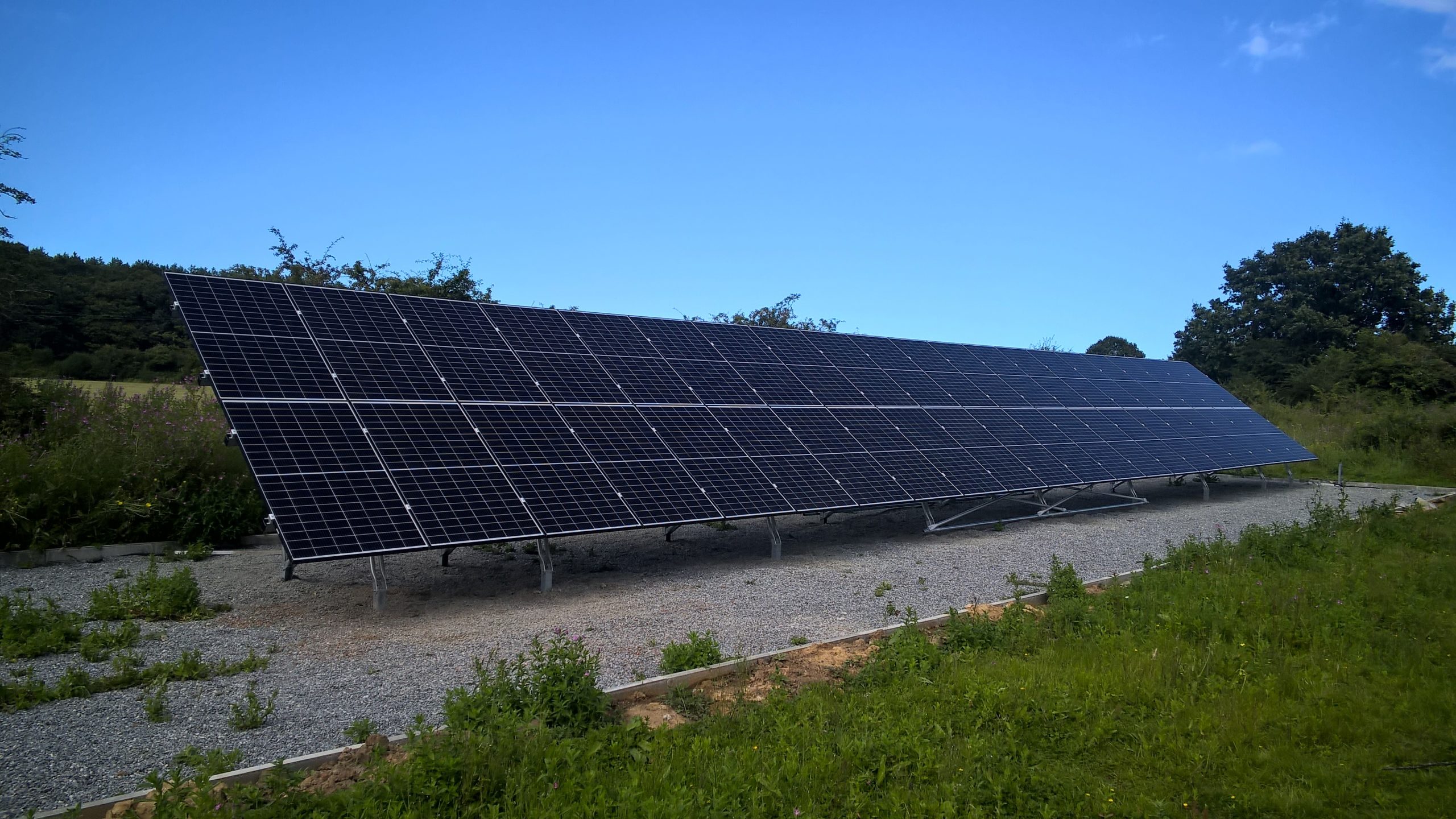 A 14.28 kWp ground mounted PV array connected to an Energy Storage ...