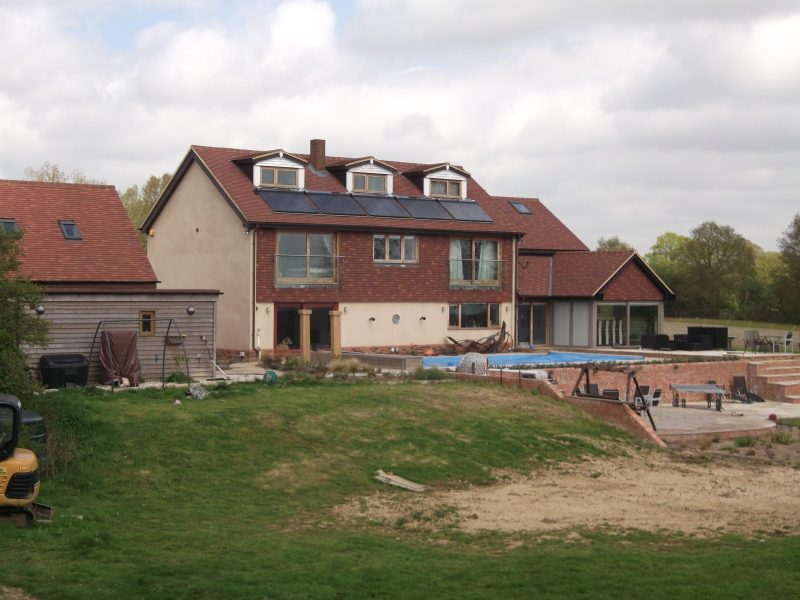 Large, detached house and outdoor swimming pool with an 850 litre ...